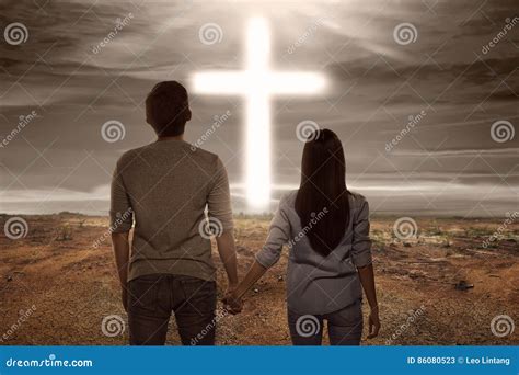 Asian Couple Holding Hand Each Other Looking Bright Cross Shape Stock