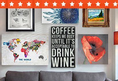 A Living Room Filled With Furniture And Pictures On The Wall