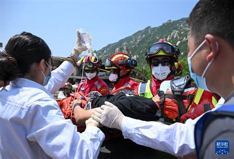中国救援队和中国国际救援队顺利通过联合国国际重型救援队能力复测 新华网