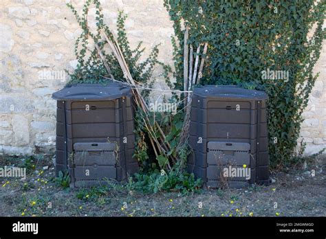 Compost Recycled Plastic Duo Composter At The Bottom Of The Garden