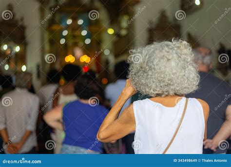 Catholic And Candomble Believers Pray During Mass At The Rosario Dos