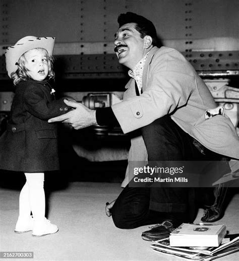 American Actress Mia Kovacs Dressed In A Cowboy Hat And Her Father