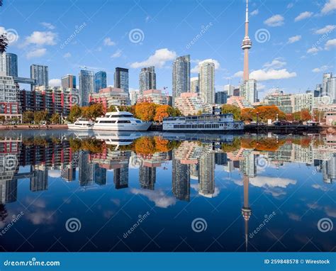 Scenic View Of Toronto City And The Cn Tower Reflecting On The Surface