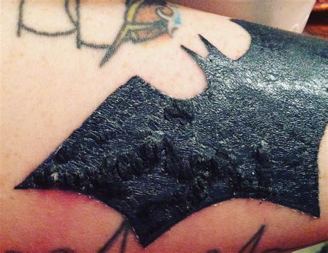 Overworked Tattoo