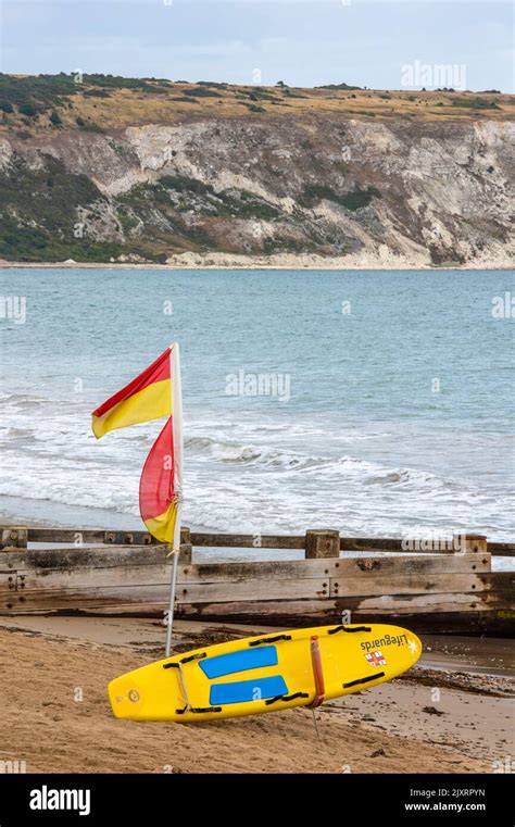 Lifeguards Board And Safety Flags On A Beach Rnli Beach Lifeguards Kit And Flags Denoting Safe