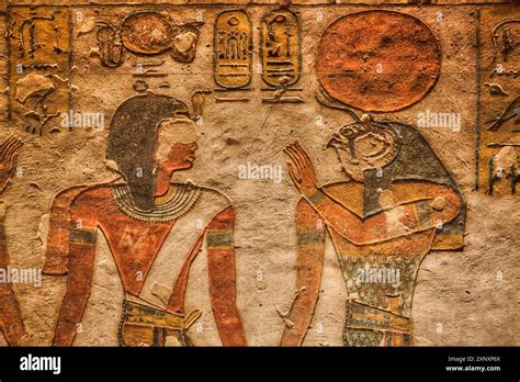 Relief Of Pharaoh On Left And Egyptian God Ra Tomb Of Rameses Iii