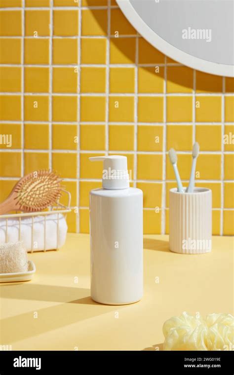 Many White Items And A Bottle With No Label Over A Simple And Spotless Bathroom Background A