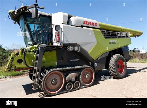 A Claas Lexion 880 Combine Harvester On Its Way Out To Bring In The