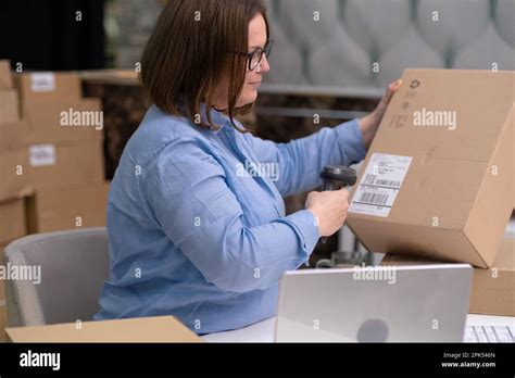 Manager Online Shop Small Business Checking Purchase Orders Scanning Barcodes For Shipping