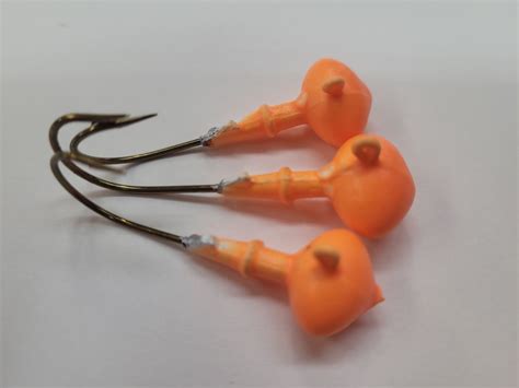 38 Oz Orange Glow Football Jig Head 3 Pack Lakeshore Tackle