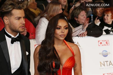 Hofit Golan Wearing A White Dress With A Deep Cleavage Revealing Her Big Boobs The Baftas At