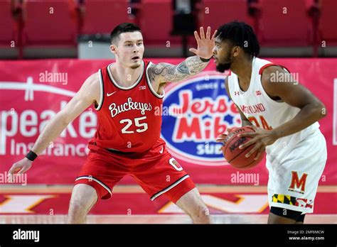 Ohio State Forward Kyle Young 25 Defends Against Maryland Forward