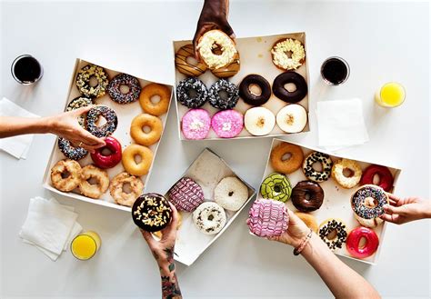 Group Hands Holding Sweeten Donut Premium Psd Rawpixel