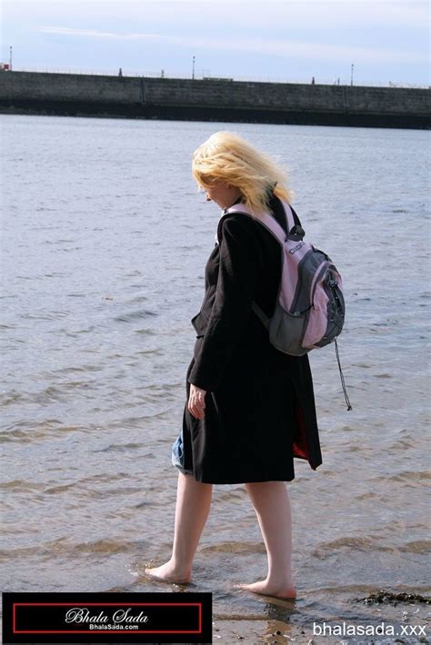 Solo Blonde Hottie Washing Her Feet In A River 15 Photos