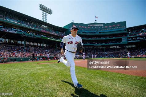 Enrique Hernandez Of The Boston Red Sox Runs Onto The Field Before A