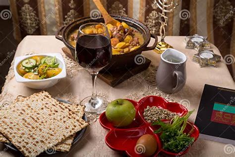 A Set Table For The Passover Seder With Traditional Matzah Wine Maror