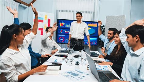 Analyst Team Leader Celebrate With Colleague After Successful Meeting
