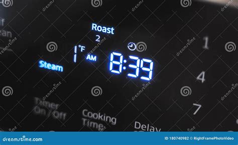 Close Up Of Oven Display Flickering Control Panel Blinking Electricity Problem Stock Photo