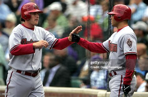 Stephen Drew Of The Arizona Diamondbacks Is Greeted By Scott Hairston
