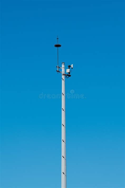 Wind Indicator On Top Of A Light Pole Stock Image Image Of