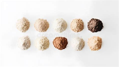 Different Types Of Flour On White Background Flat Lay Stock Image