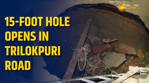 Deep Hole Forms On Delhi Road Zee Business