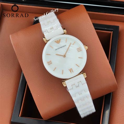 ساعت دنیل ولینگتون زنانه ساده بند سرامیکی رنگ سفید صفحه سفید رزگلد فروشگاه سراد