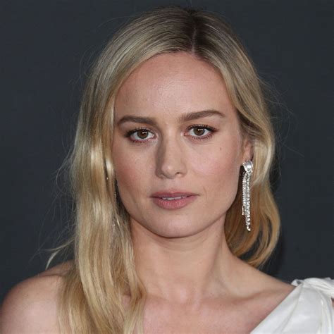 Brie Larson Stuns In A Fiery Red Sweater Dress As She Reveals She Dabbled In Music In The Early