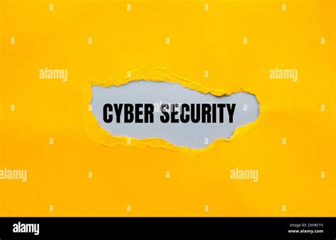 Cyber Security Message Written On Ripped Yellow Torn Paper With Gray
