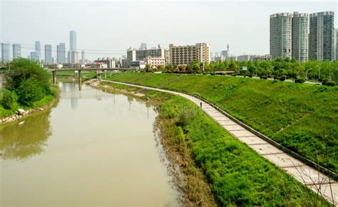 The Sidewalk By The Artificial River Editorial Stock Image Image Of Artificial Sino 276085679