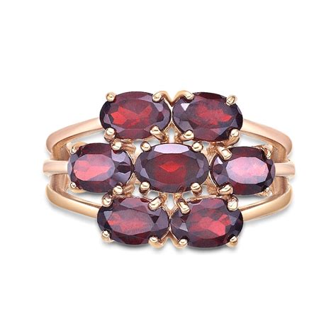 Sideways Oval Garnet Seven Stone Triple Row Split Shank Flower Ring In