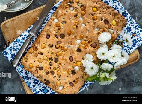 Easter Mini Chocolate Egg Traybake With Hazelnuts And Cranberries Stock