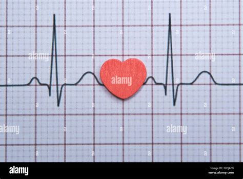 Closeup Image Of A Red Heart On A Electrocardiogram Ecg Printout The