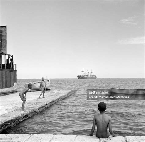 Young Local Boys Swim In The Harbor In Kingston Jamaica News Photo