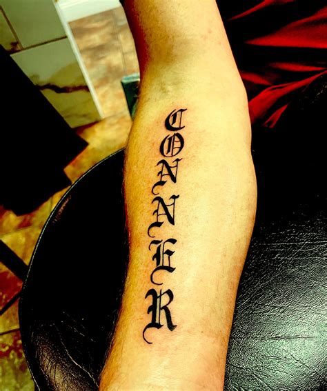 Old English Font Tattoo Arm