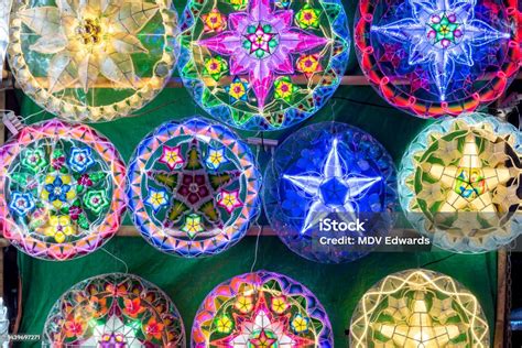 Brightly Colored Parols For Sale At A Stand At Nighttime A Filipino