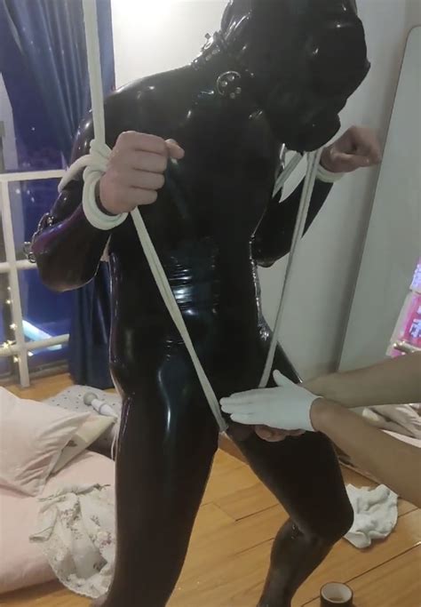 Rubber Gimp And Gas Mask Got His Dick Massaged Rubber Gimp And Gas Mask Got His Dick Massaged