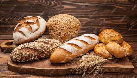 Premium Photo Set Of Various Bread On Stone Surface