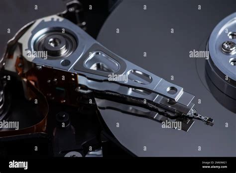 The Block Reads The Magnetic Hard Disk Drive Head Stock Photo Alamy