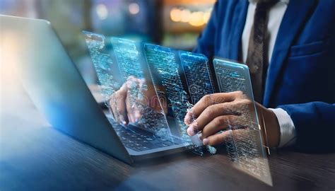 A Person In A Suit Works On A Laptop Interacting With Holographic