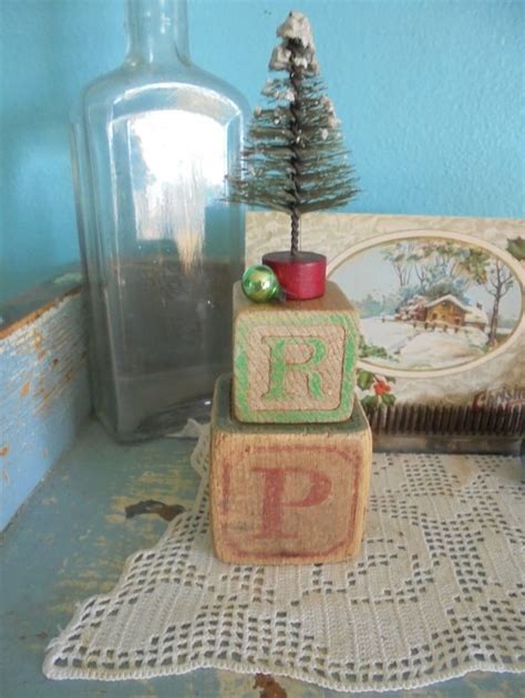 Vintage Christmas Assemblage With Toy Blocks And Bottle Brush Tree