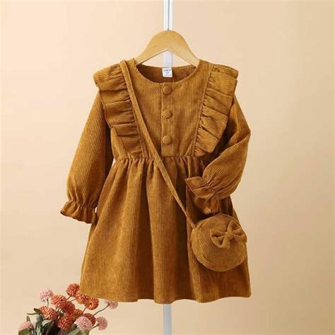 پیراهن پاییزی بچه گانه با رنگ خردلی مخصوص آبان 1402