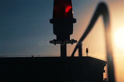 Selective Focus On A Light Siren With A Beautiful Sunset Visible In The