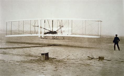 The Wright Brothers Making Their First Powered Flight