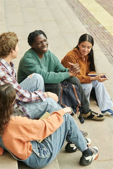 Smiling Friends Chatting On Urban Steps Sharing Stories Stock Image Image Of Interaction