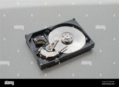Closeup Of Hdd Revealing Its Internal Components Showing Innovation And Technological Storage