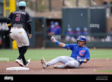 Chicago Cubs Nicky Lopez Right Slides Into Second Base With A Double As Arizona Diamondbacks