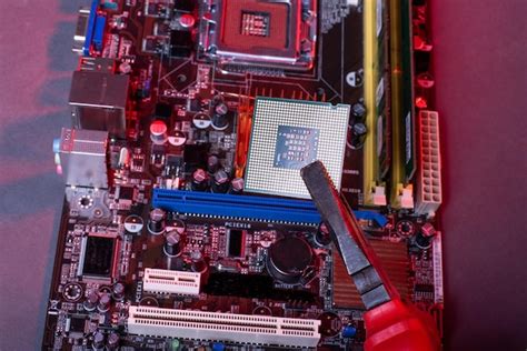 Premium Photo Computer Processor Microprocessor On The Motherboard Red Neon Light