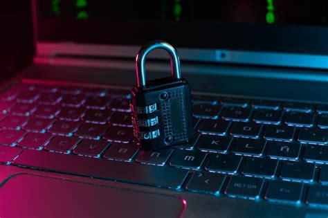 Premium Photo Lock On Laptop As Computer Protection And Cyber Safety Concept On Neon