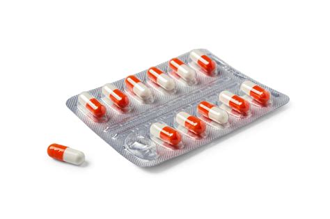 Premium Photo | Capsule tablets in pack isolated on white